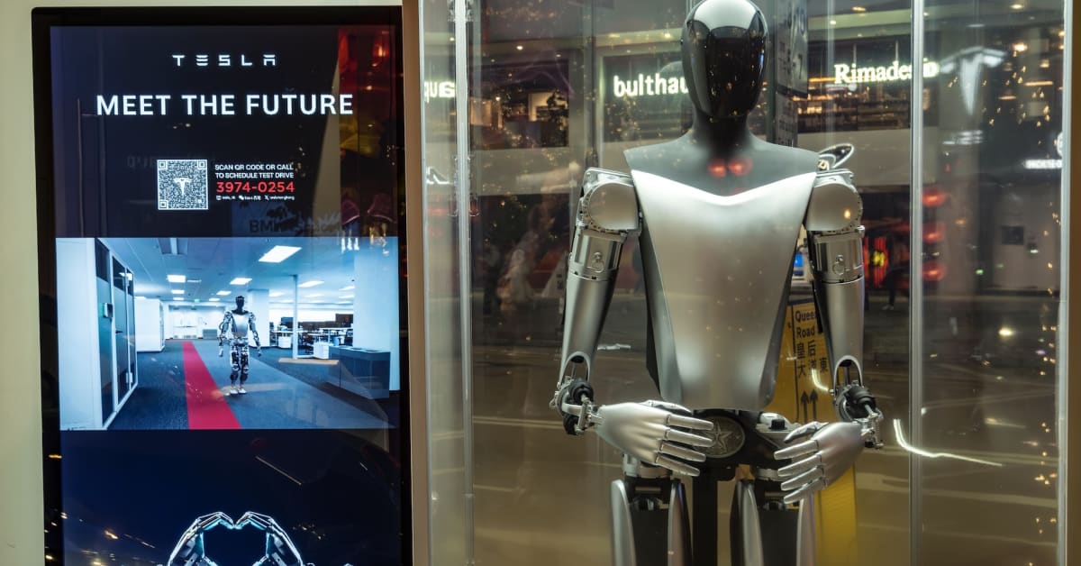 Tesla’s Optimus Robot Reveal Inspires Hilarious Memes Abo...