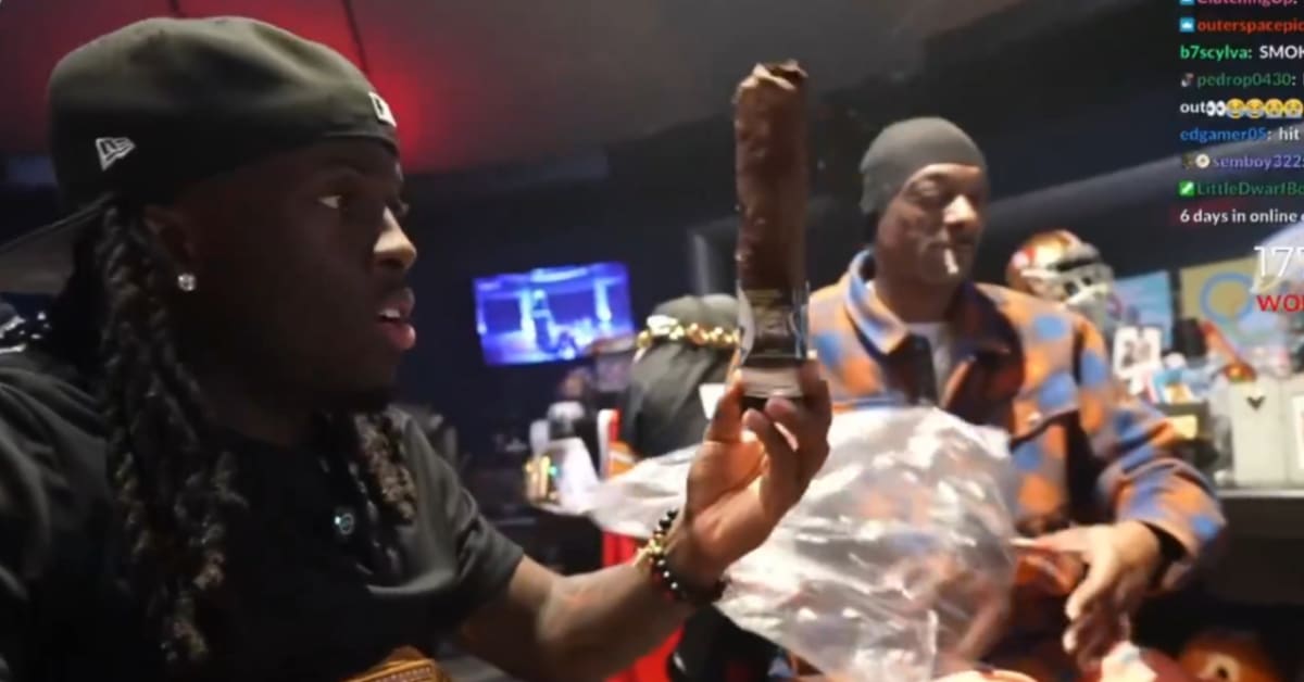 Snoop Dogg Brandishes 'Supersized' Blunt During Kai Cenat...