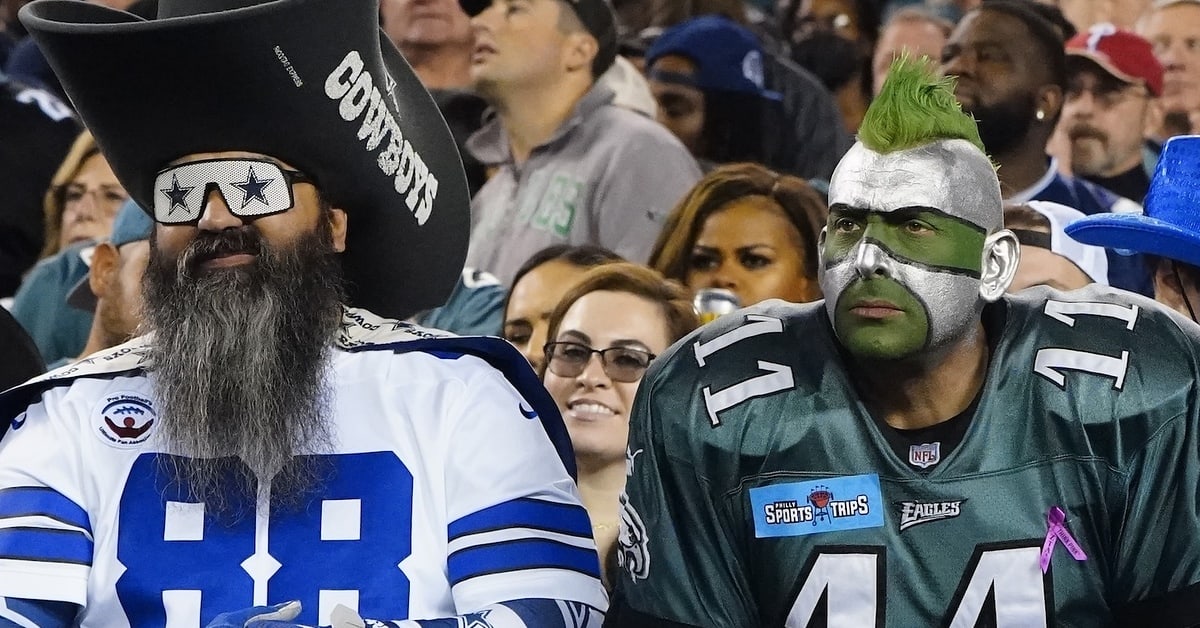 Video Shows Cowboys and Eagles Fans Almost Knock Over Mem...