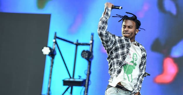 Playboi Carti Fan Goes Flying Into Crowd After Stage-Cras...