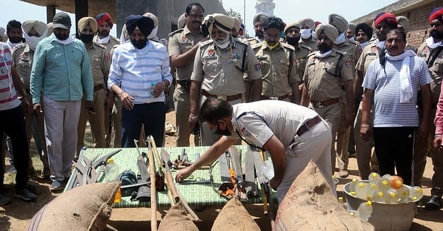 India Police Officer Gets Hand Chopped Off by Sword While Enforcing ...
