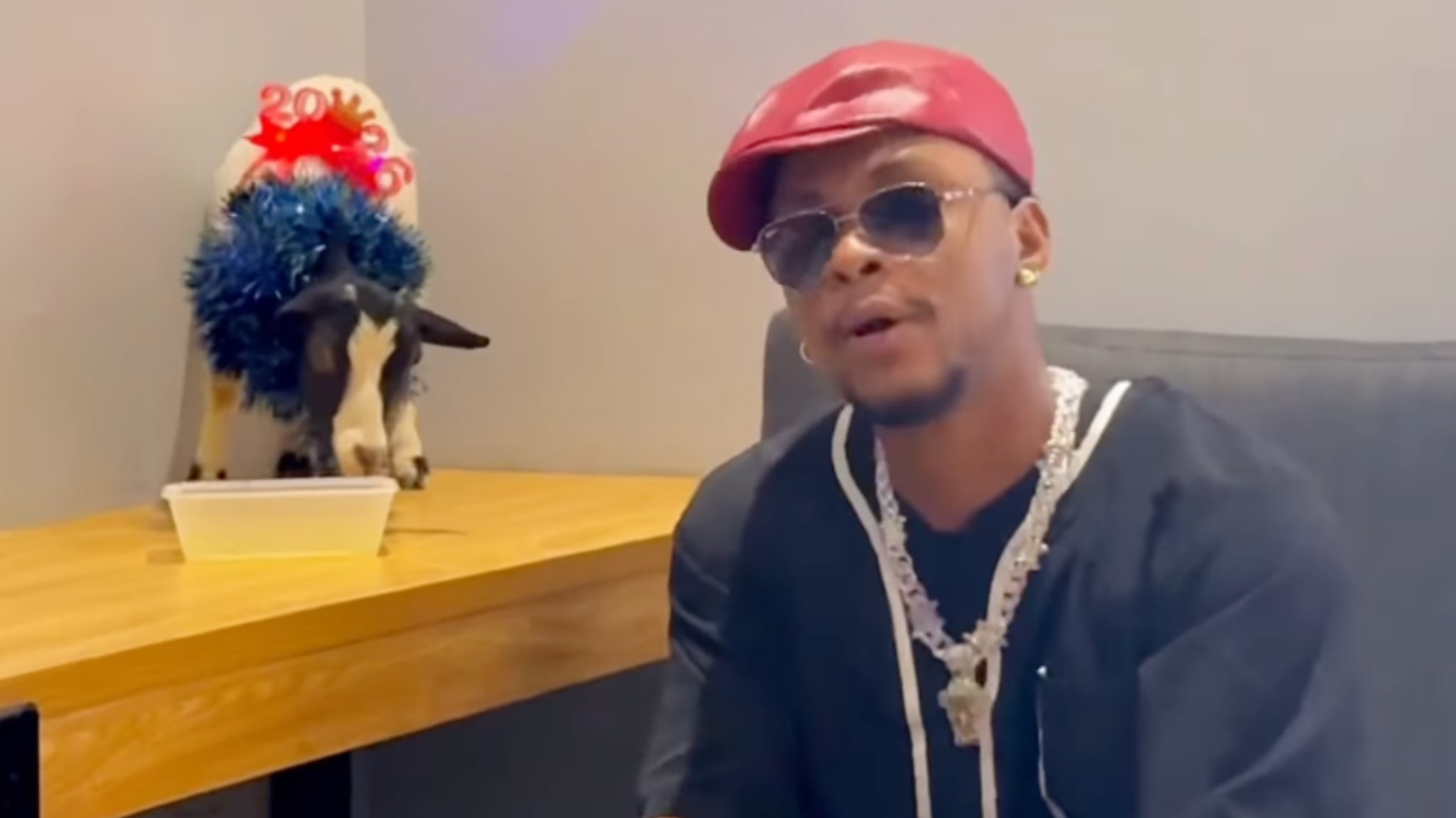 Nigerian Rapper Faces Backlash After Dragging Goat on Sta...
