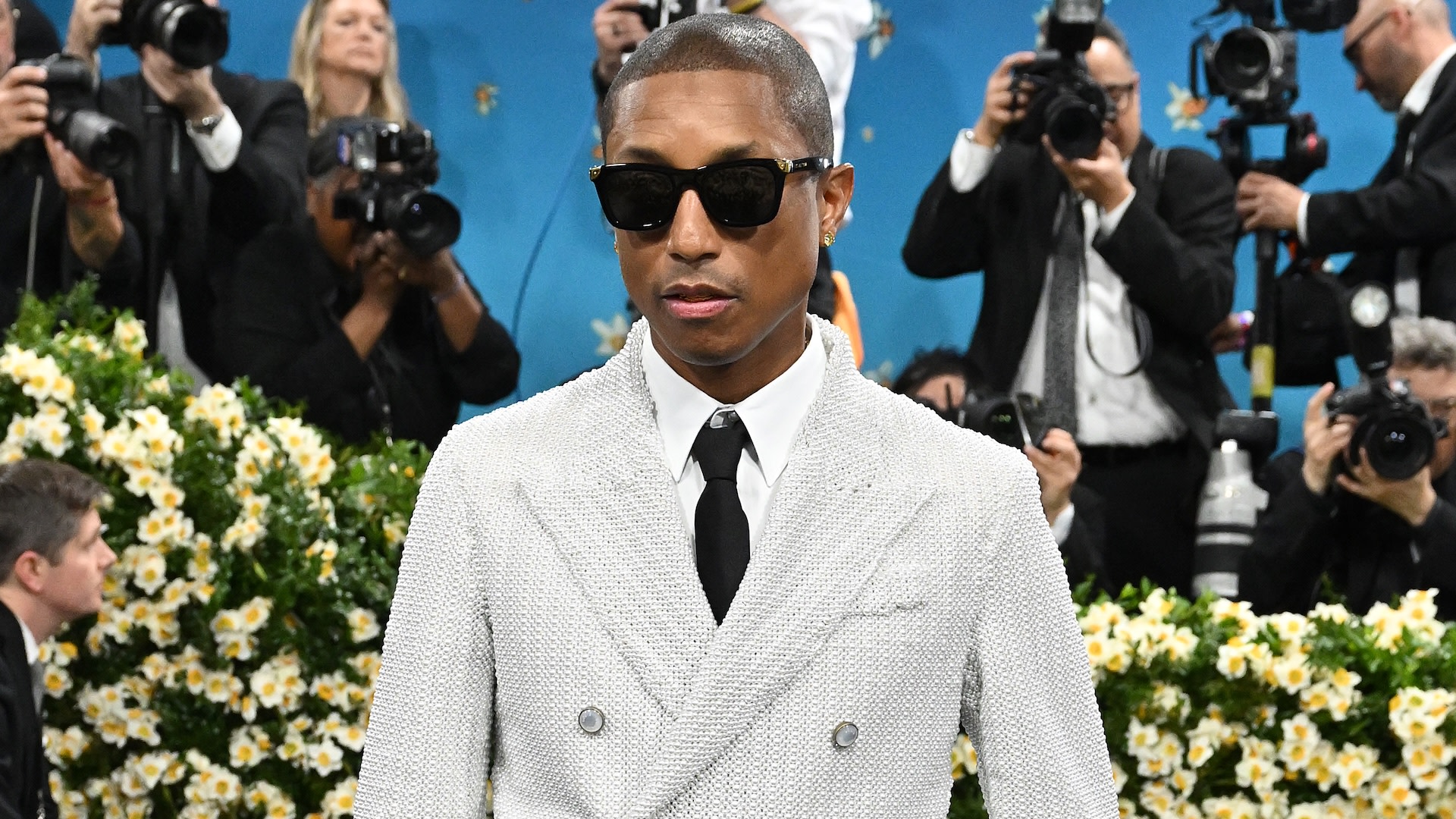 Pharrell Says His Met Gala Gold Grill Is Actually Invisal...