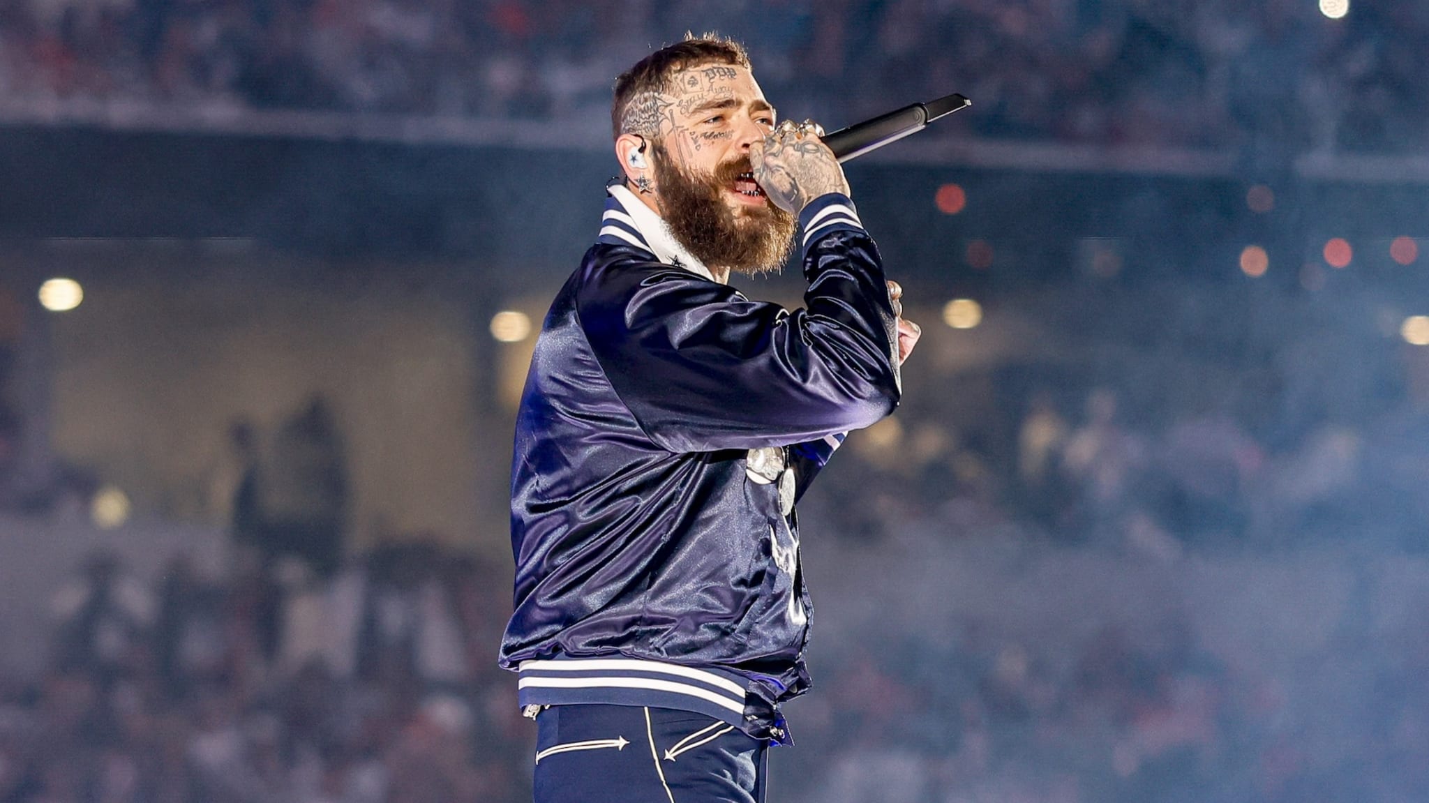 Watch Post Malone Fall While Attempting Backflip