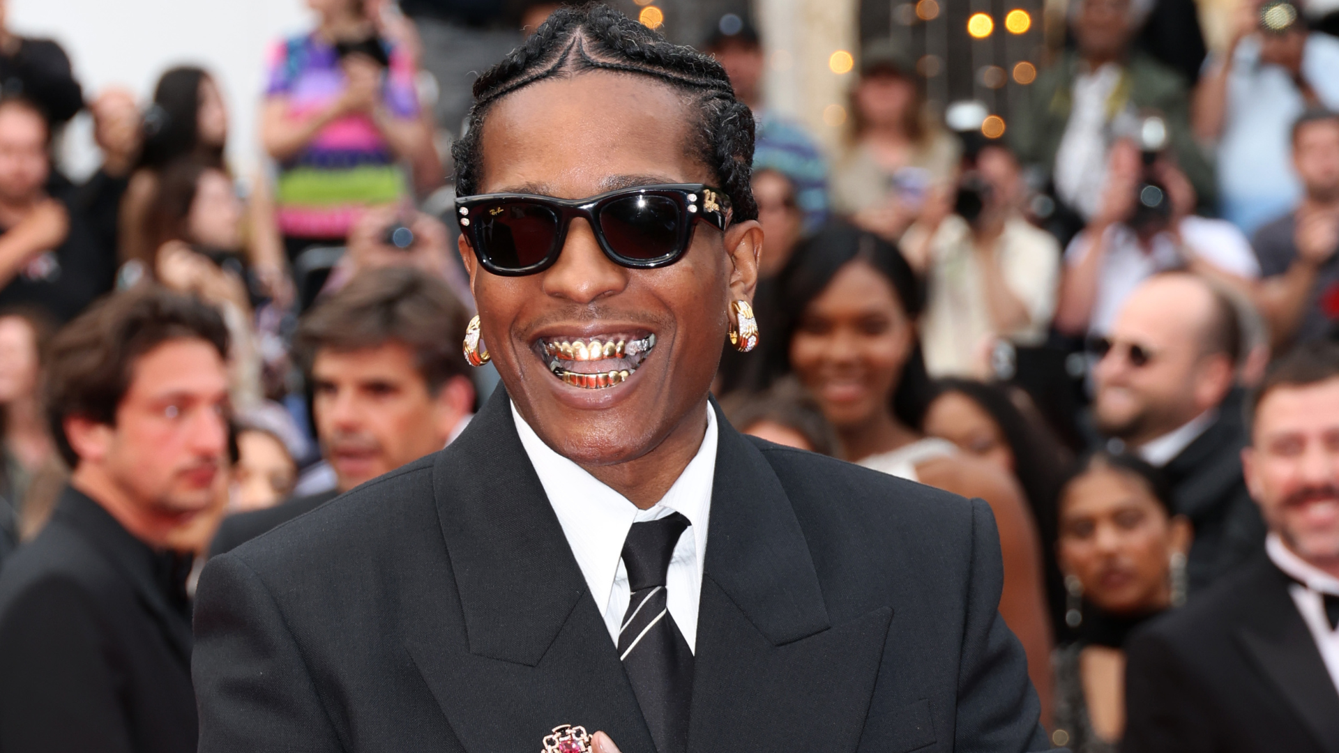 ASAP Rocky Picks Up Son Riot on the Runway at AWGE Fashio...