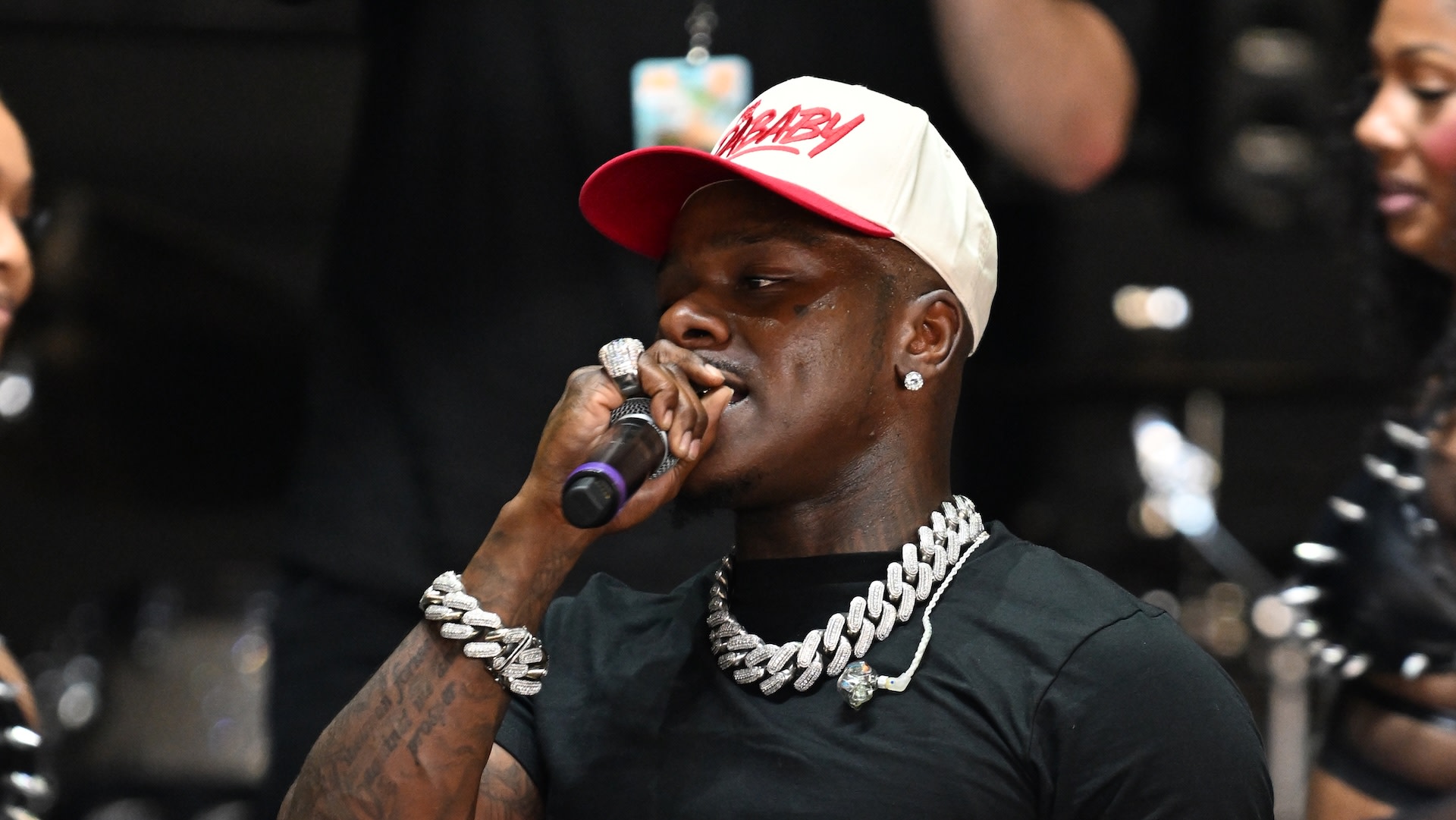 DaBaby Spotted Exchanging Words With Hornets Heckler In Viral Video