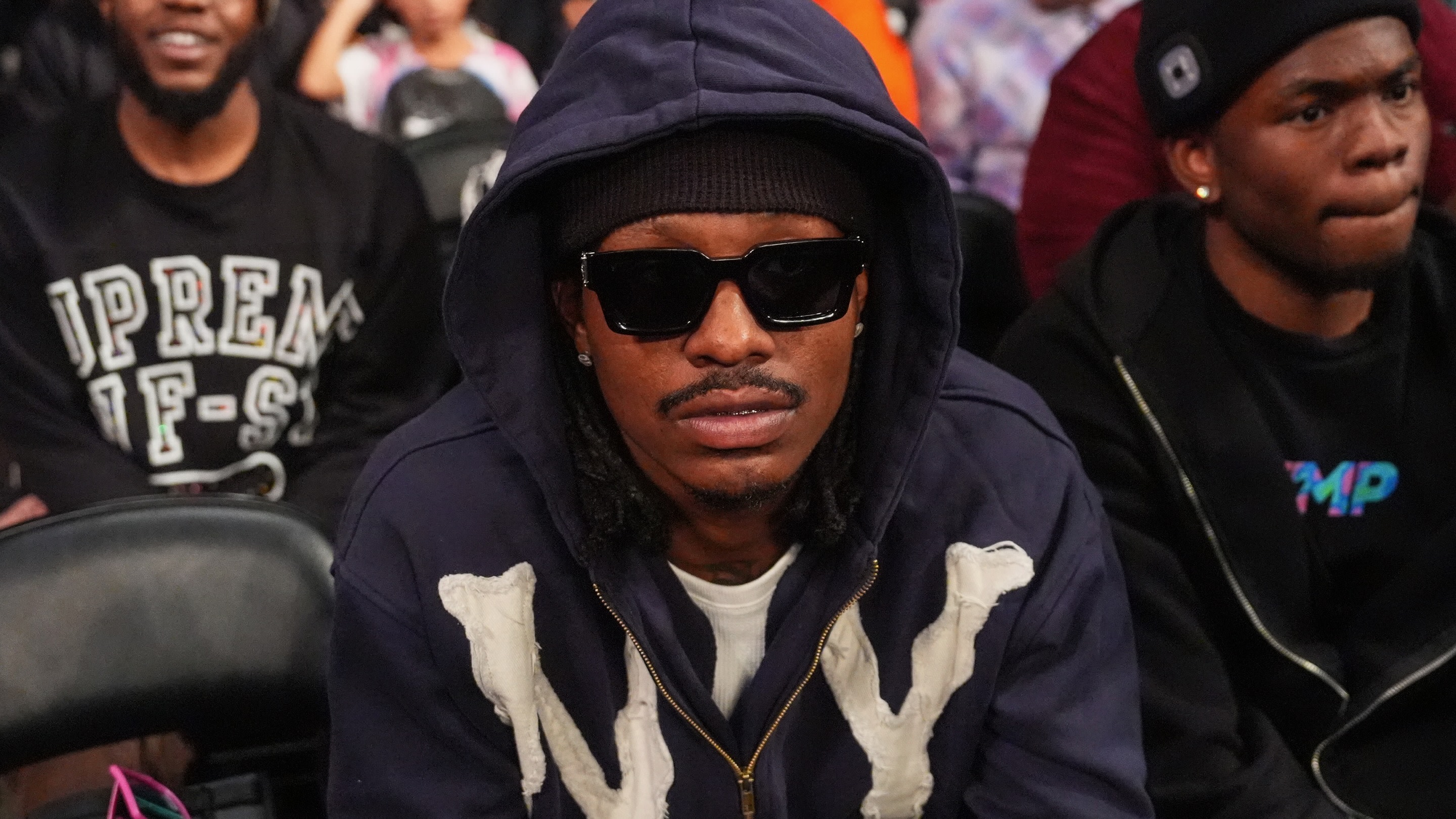 Duke Dennis Defends AMPs Tone Target Deal Amidst 'Stupid'...