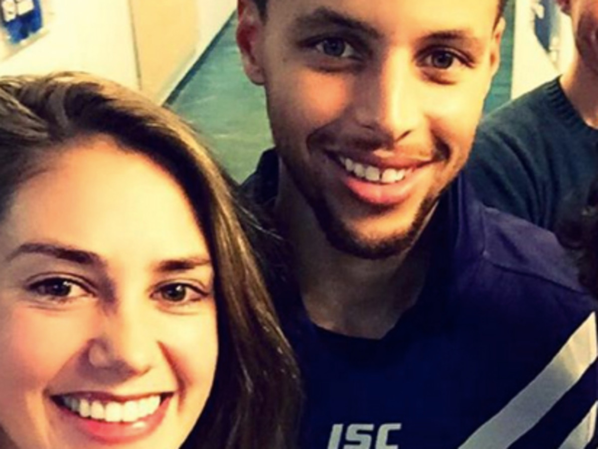 Steph Curry Kicks Sherrin Football, Rocks Fremantle Dockers Jersey ...