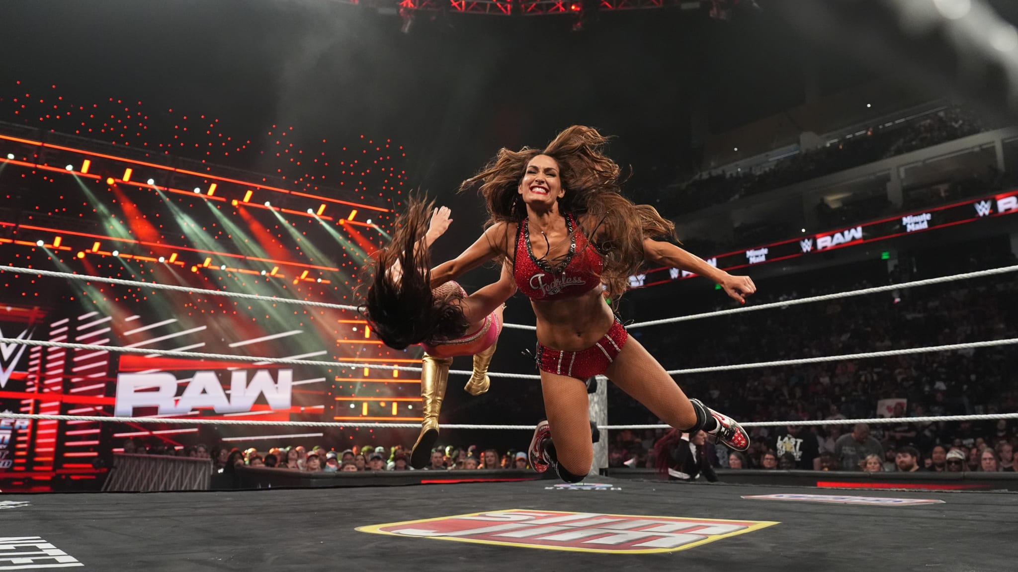 WWE Star Nikki Bella Suffers Breast Implant Injury in Mat...