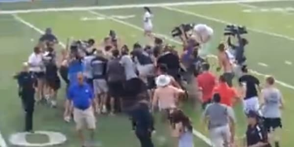 A Police Officer Is Under Investigation for Tripping High School ...