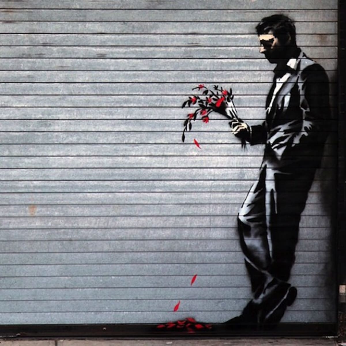 Banksy Is Back with His Would-Be 24th Piece, a Man with Wilted Flowers ...