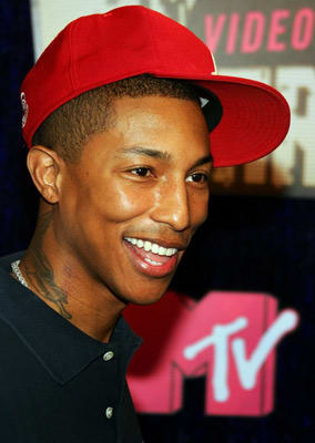 Pharrell - Floss Daily: 25 Rappers With Great Teeth | Complex