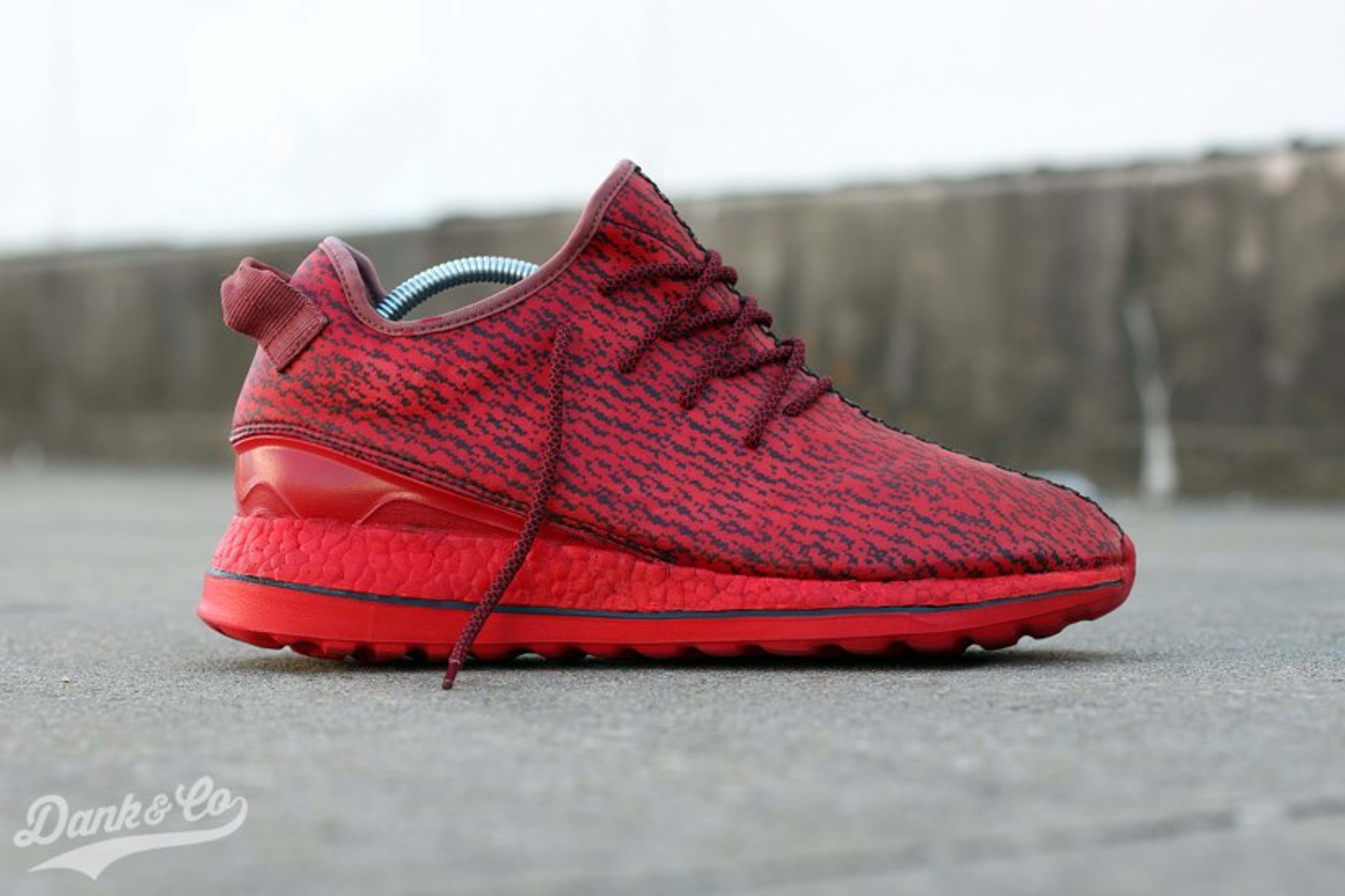 What Adidas Yeezy Cleats Look Like Converted to All-Red Sneakers