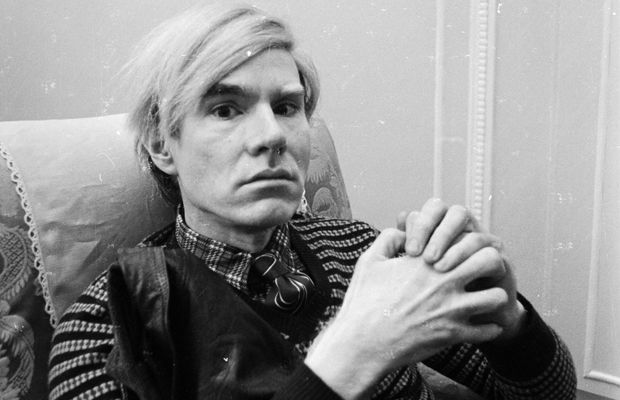 Warhol adopted his gray-haired look while in his 20s so that people ...